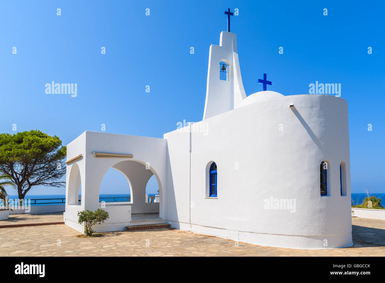 White Greek church on top of a hill near Potami bay, Samos island ...