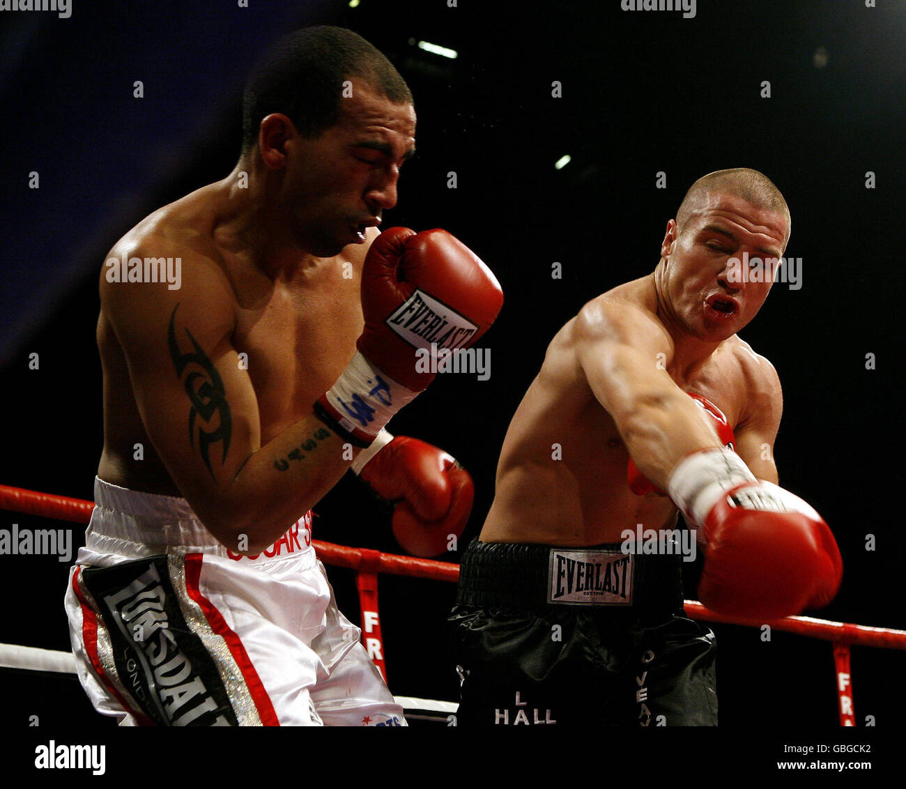 Bradley Pryce (left) in action with Mathew Hall during the Commonwealth ...