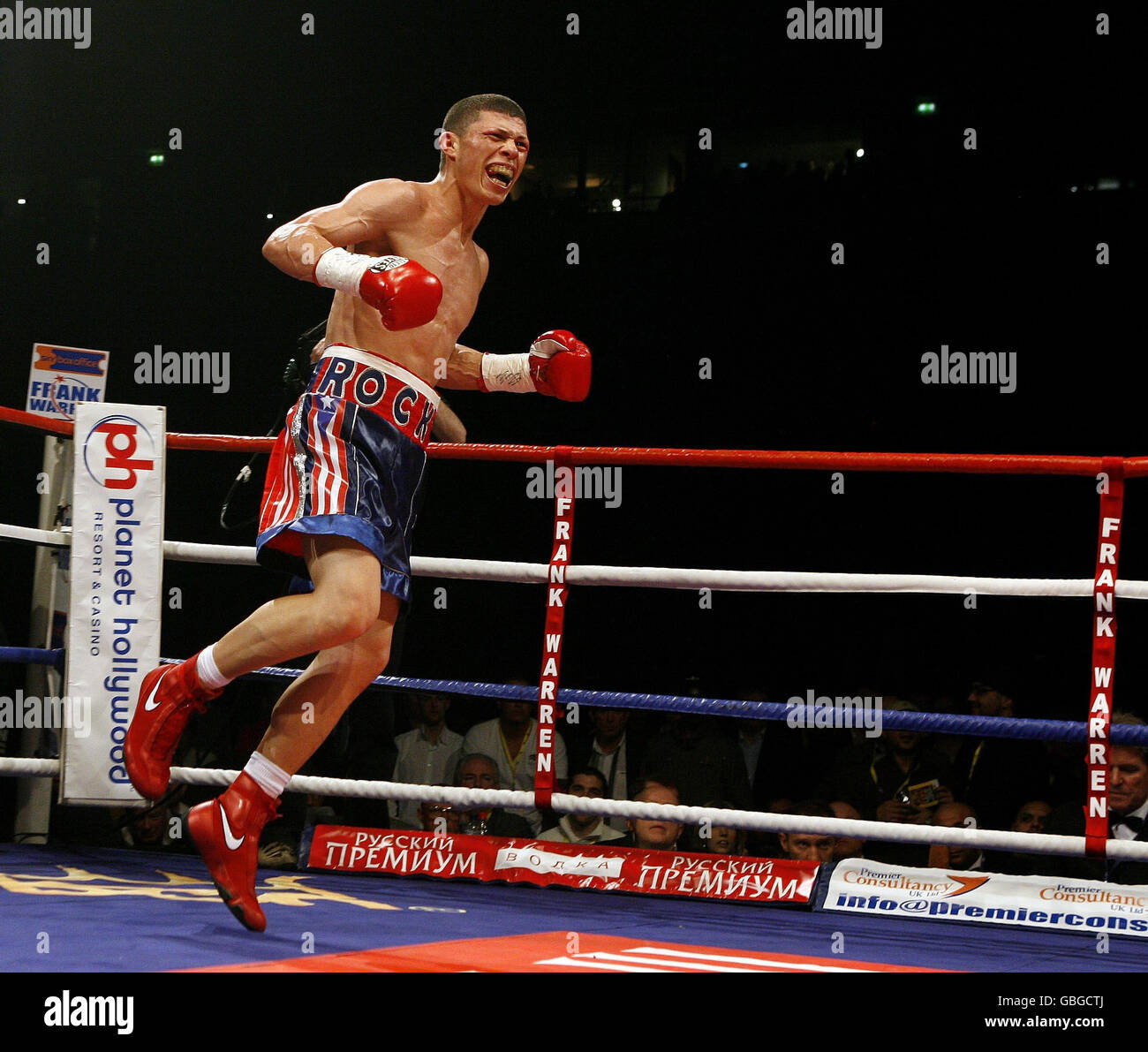 Roman Martinez celebrates his victory over Nicky Cook during the WBO ...