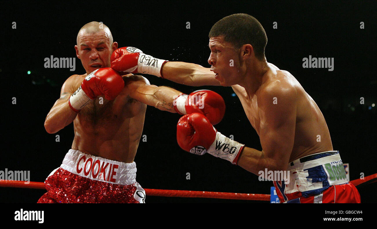 Nicky Cook (left) in action with Roman Martinez during the WBO Super ...