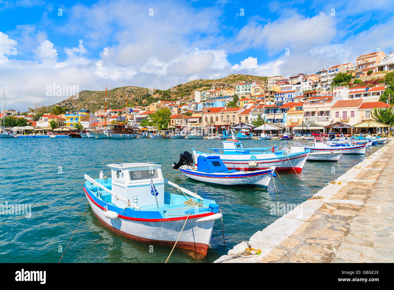 Traditional colourful Greek fishing boats in Pythagorion port, Samos ...