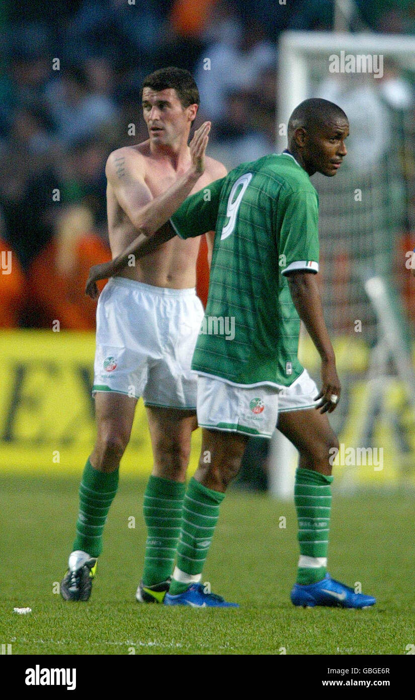 Ireland's Clinton Morrison congratulates Roy Keane after his return to ...