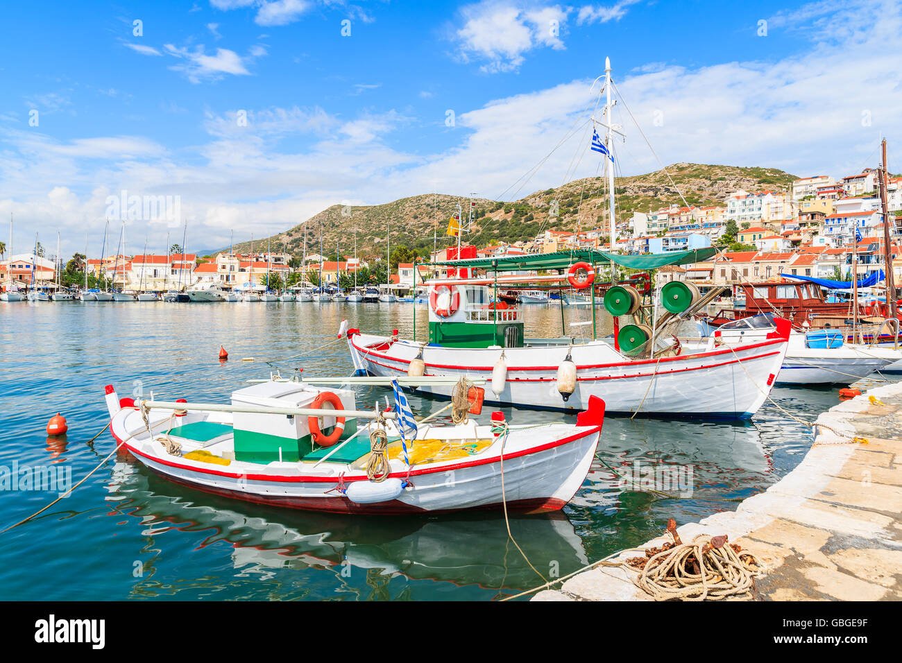 Traditional colourful Greek fishing boats in Pythagorion port, Samos ...