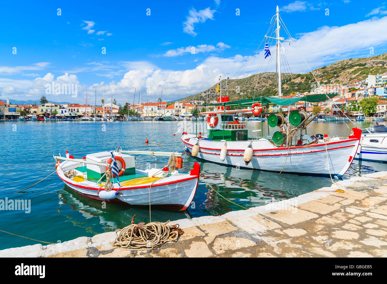 Traditional colourful Greek fishing boats in Pythagorion port, Samos ...