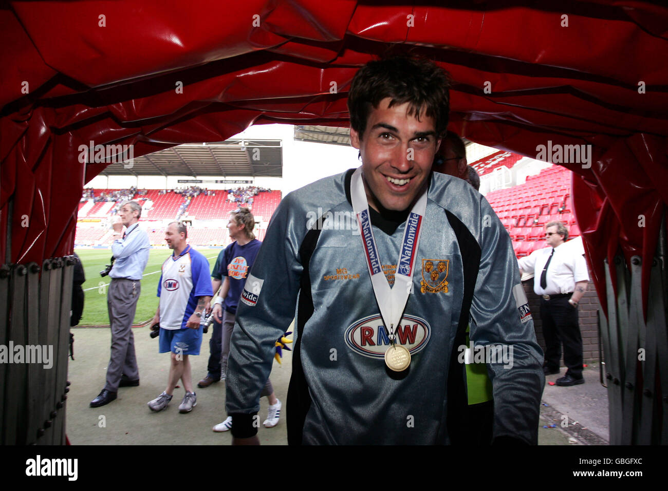 Shrewsbury Town's goalkeeper Scott Howie celebrates after winning the ...