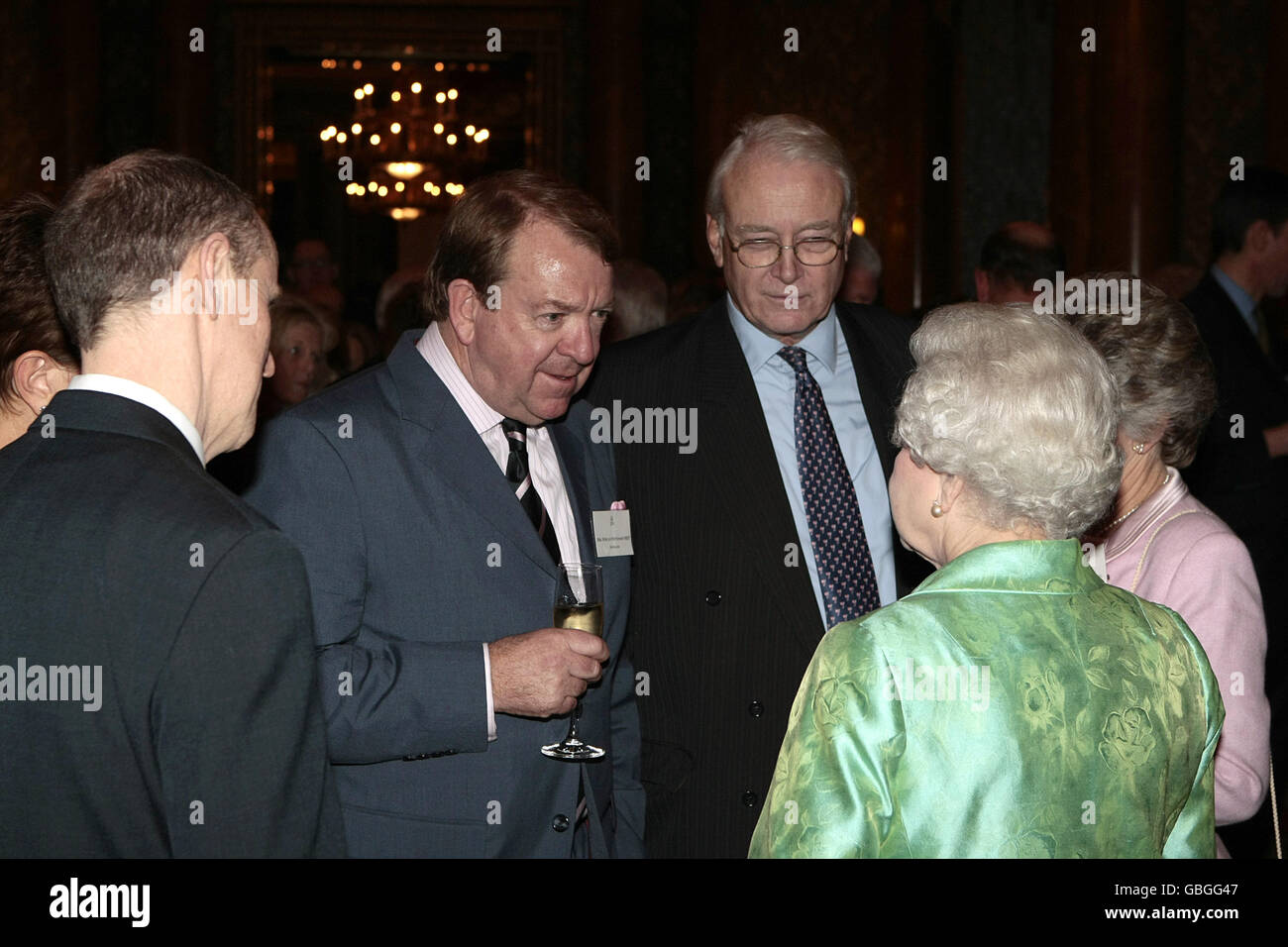 Queen Elizabeth II speaks with Members of Parliament during a reception ...