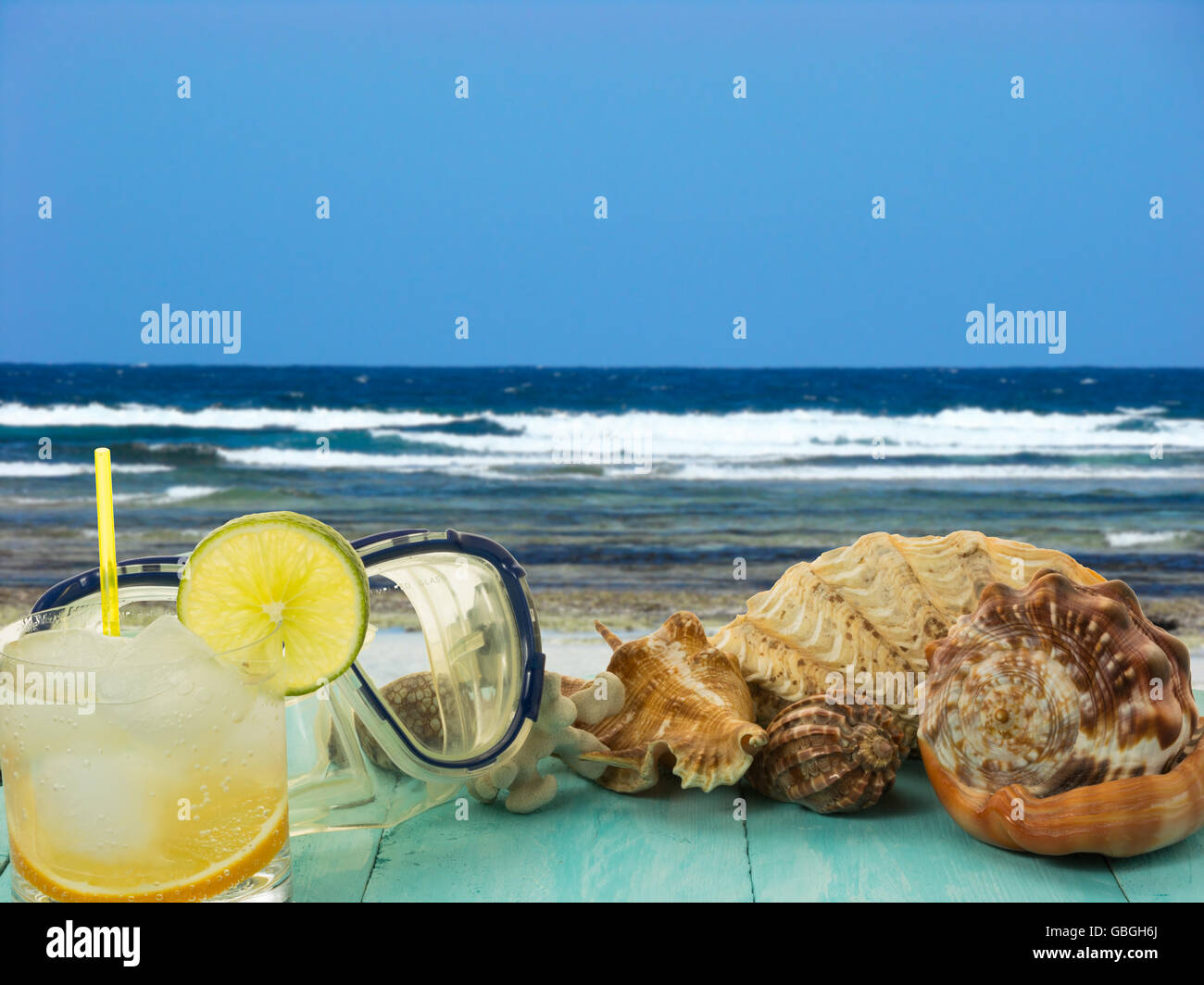 Seashells and beach cocktail. Beach cocktail. Beach party. Beach drink ...
