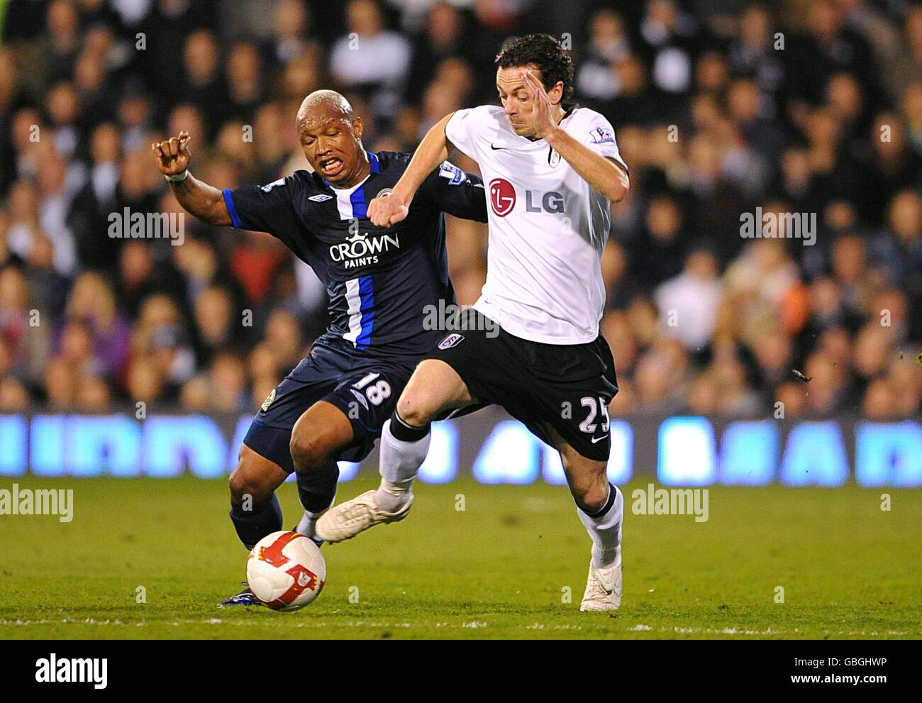 Blackburn Rovers' El-Hadji Diouf and Fulham's Simon Davies (right ...