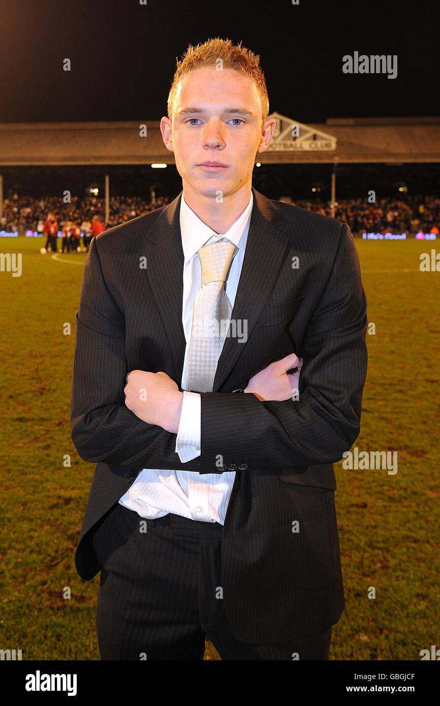 Fulham academy graduate Matthew Saunders is paraded before the crowd at ...