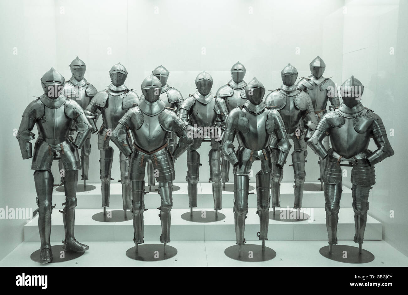 Front View of Group of Medieval Shiny Suits of Armour Stock Photo - Alamy