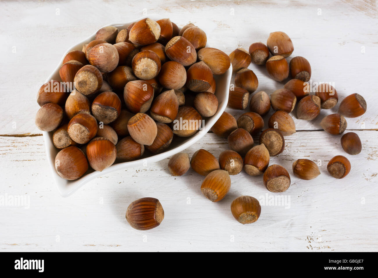 Hazelnuts on white wooden background. Nut. Healthy food. Snack ...