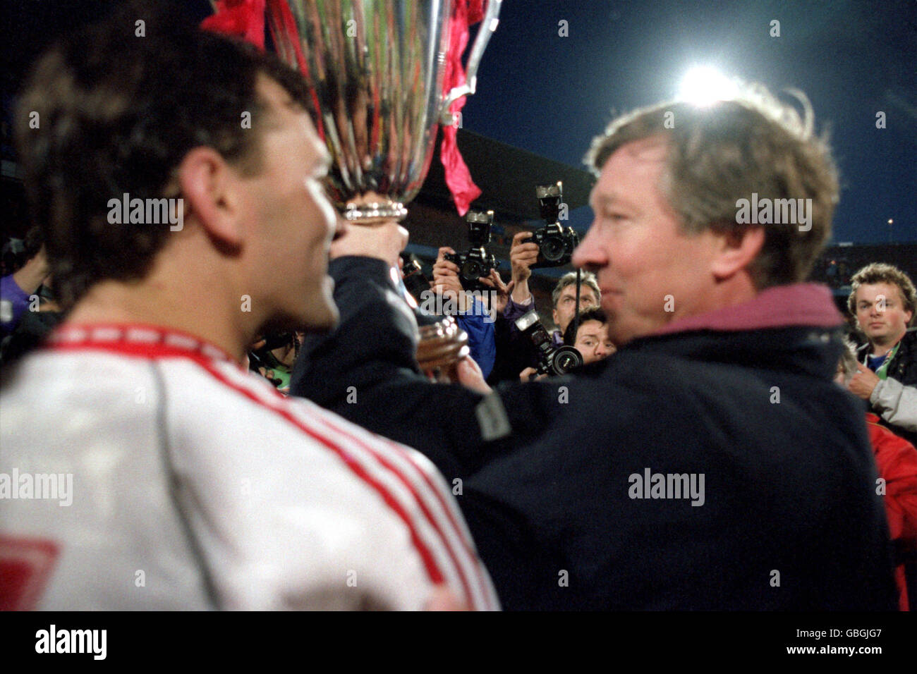 Manchester United manager Alex Ferguson (r) and captain Bryan Robson (l ...
