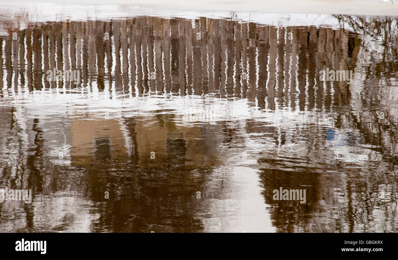 reflection of objects in fast water Stock Photo - Alamy