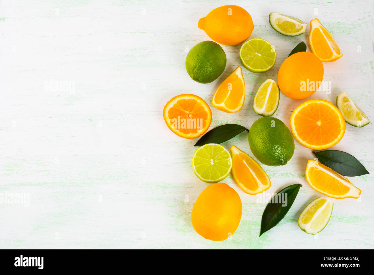 Citrus on light green background. Fruit background. Mixed fruit. Fresh ...