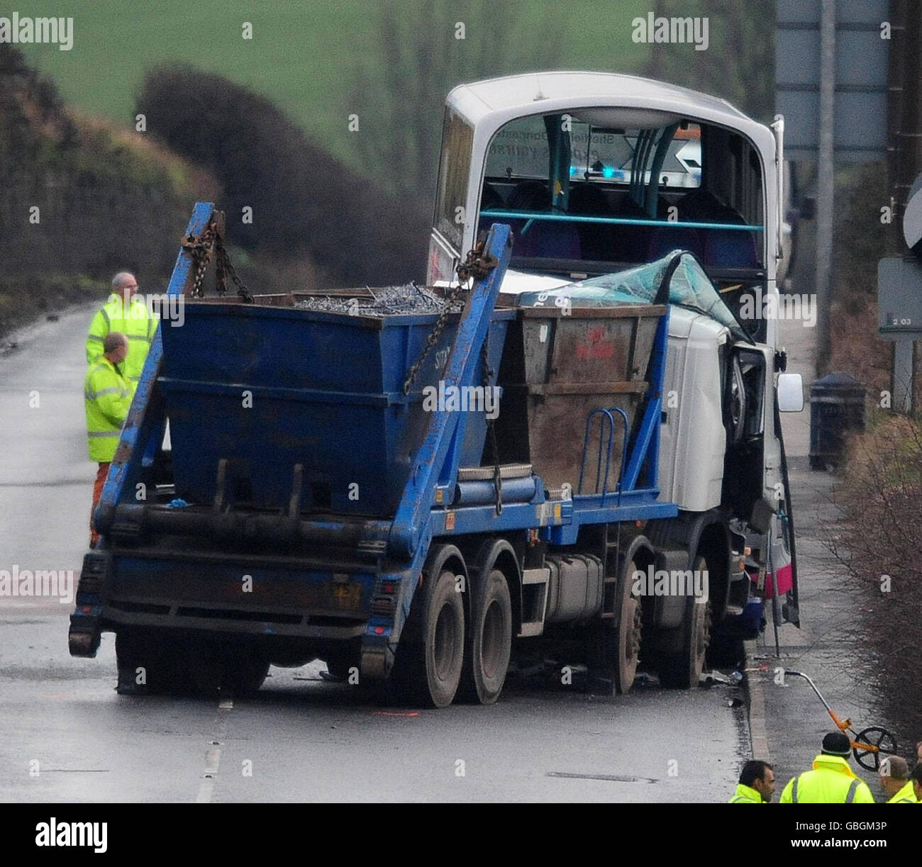 One dead as bus and lorries crash Stock Photo - Alamy