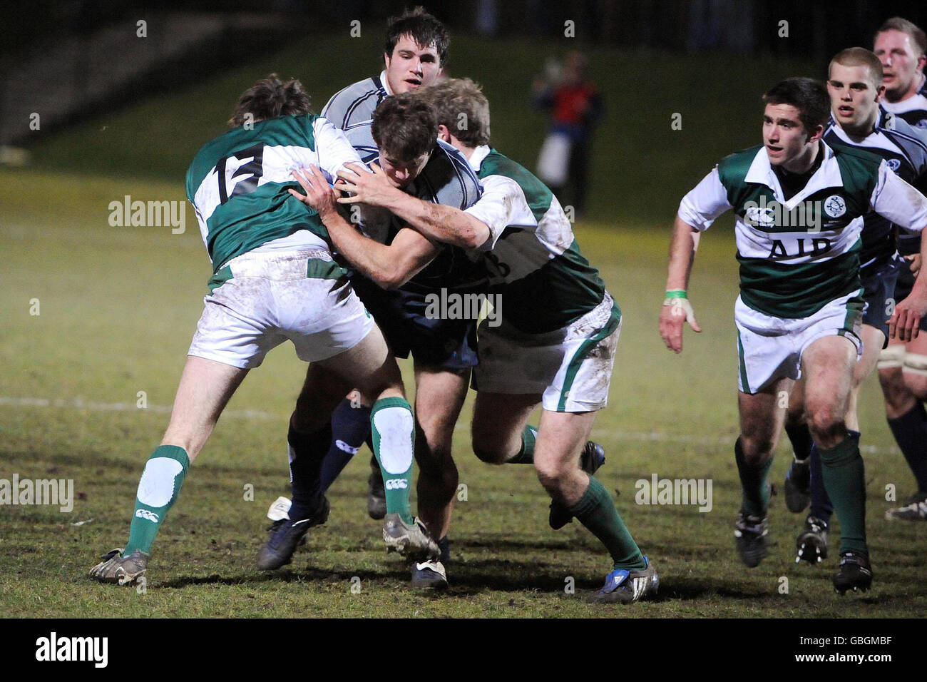 Scotland's Angus Martyn is brought down during the match at Myreside ...