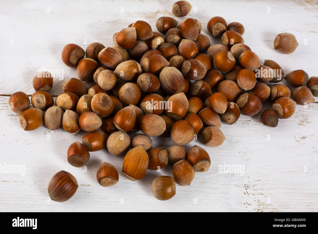 Hazelnuts on white wooden background. Nut. Healthy food. Snack ...