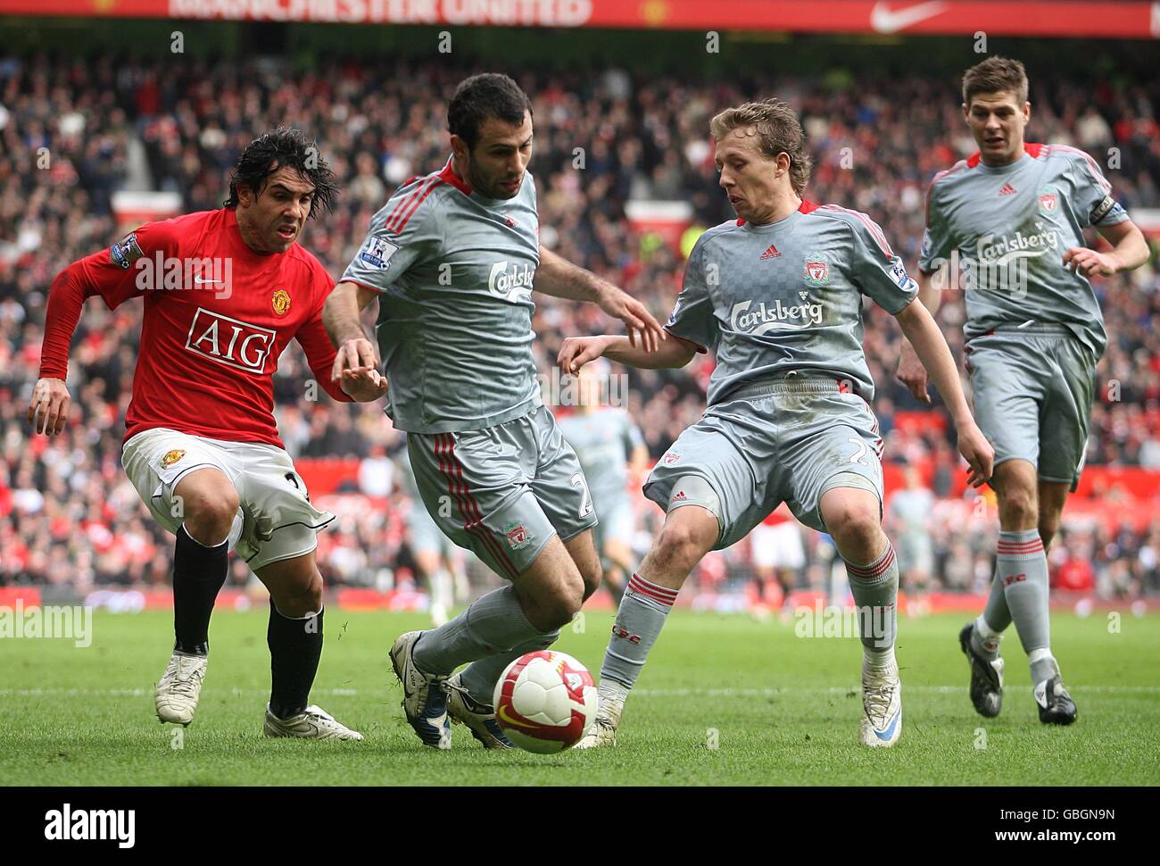 Liverpool's Javier Mascherano (left from centre) and Manchester United ...