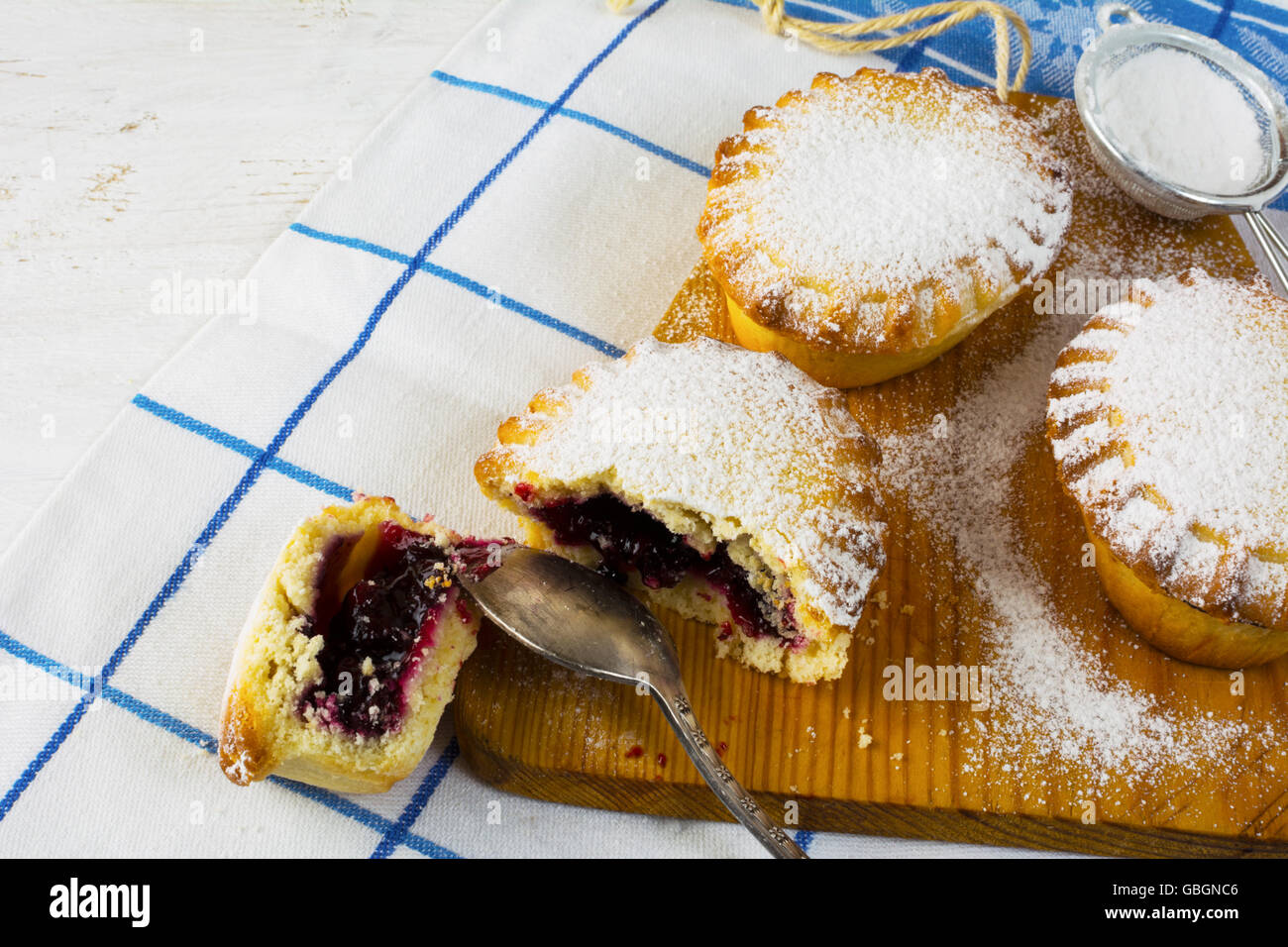 Small sweet pie on the cutting board. Jam pie. Small pie. Pie. Sweet ...