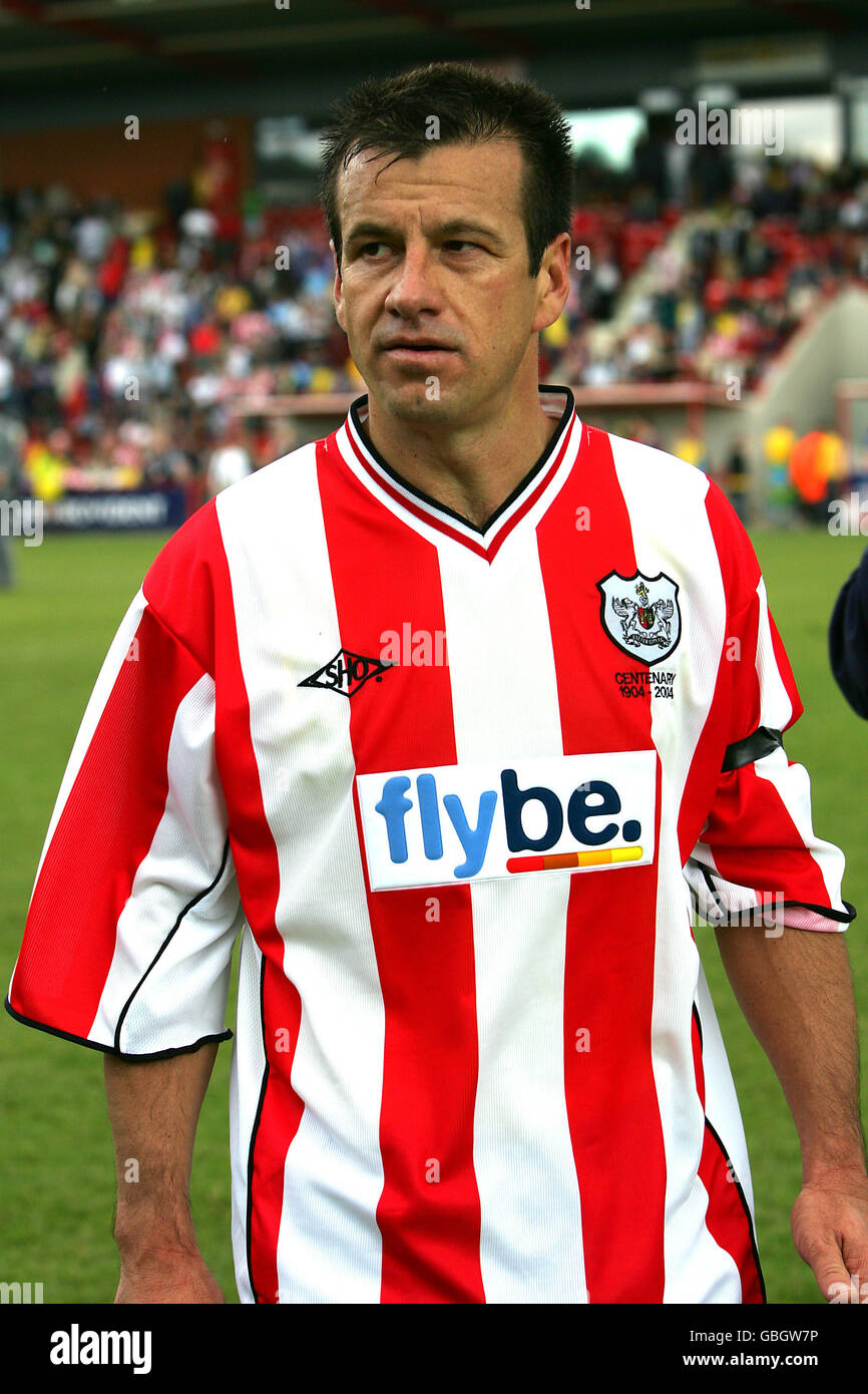 Brazil captain Dunga leaves the pitch wearing an Exeter City shirt ...