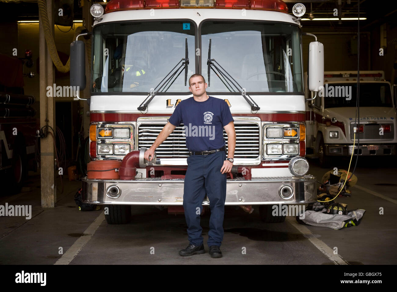 Intern firefighter Andrew Pitrowiski poses in front of a truck at the ...