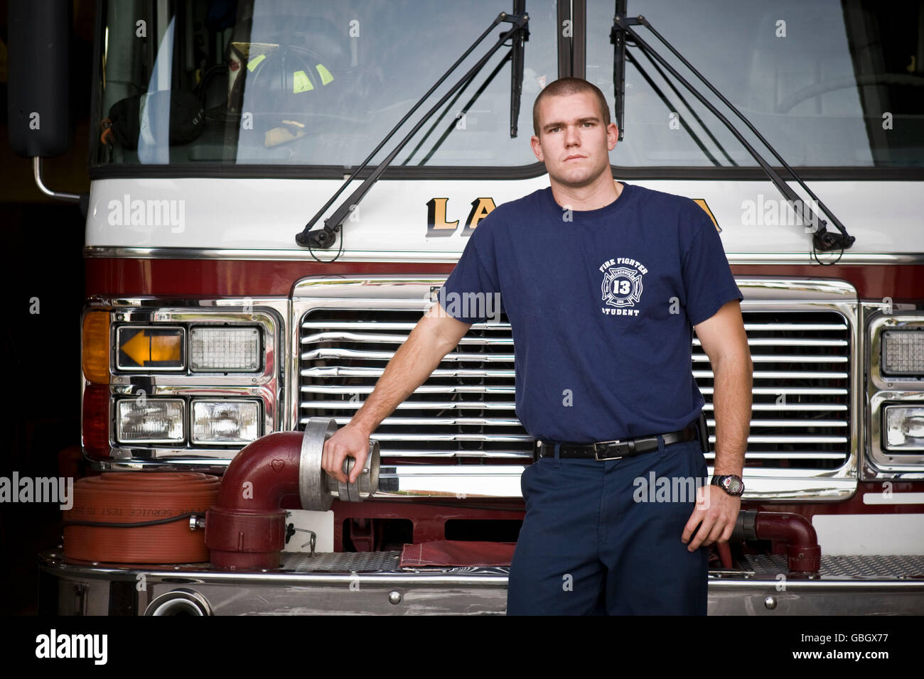 Firefighter in front of fire truck hi-res stock photography and images ...