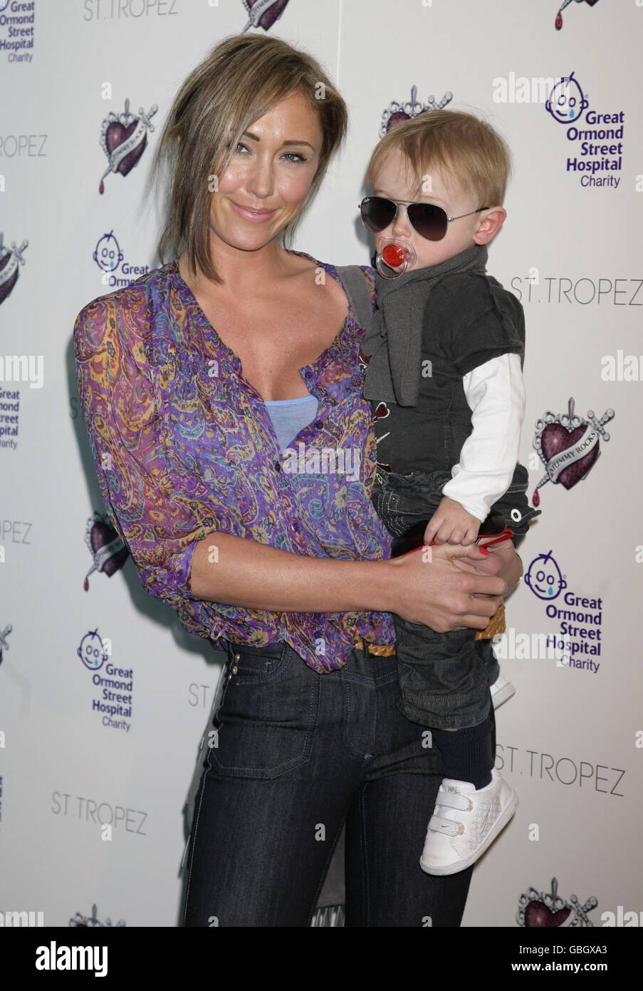 Jenny Frost and her son Casper arrive at the Mummy Rocks kids party to ...