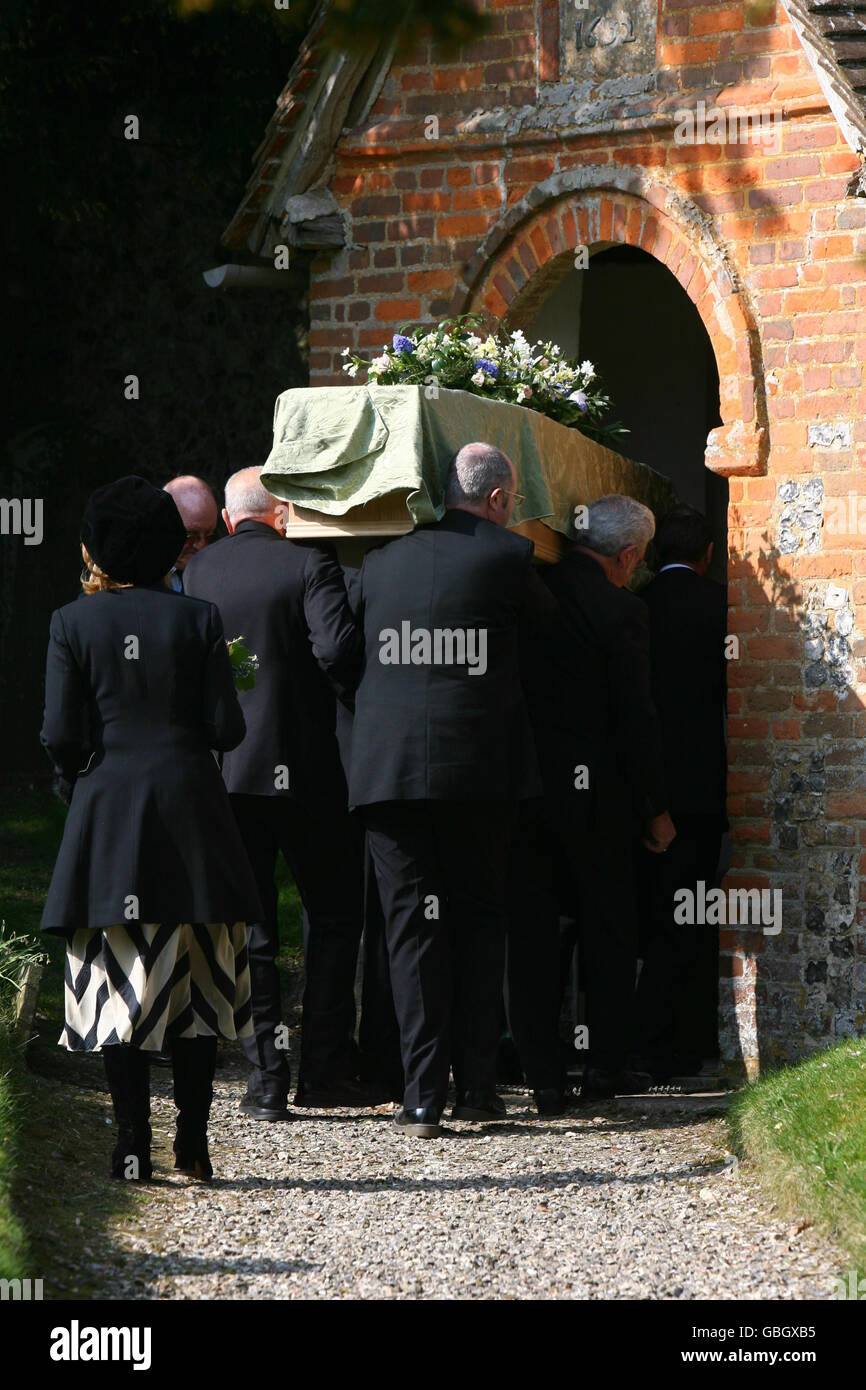 The coffin of Sir Nicholas Henderson is carried towards St Swithin ...