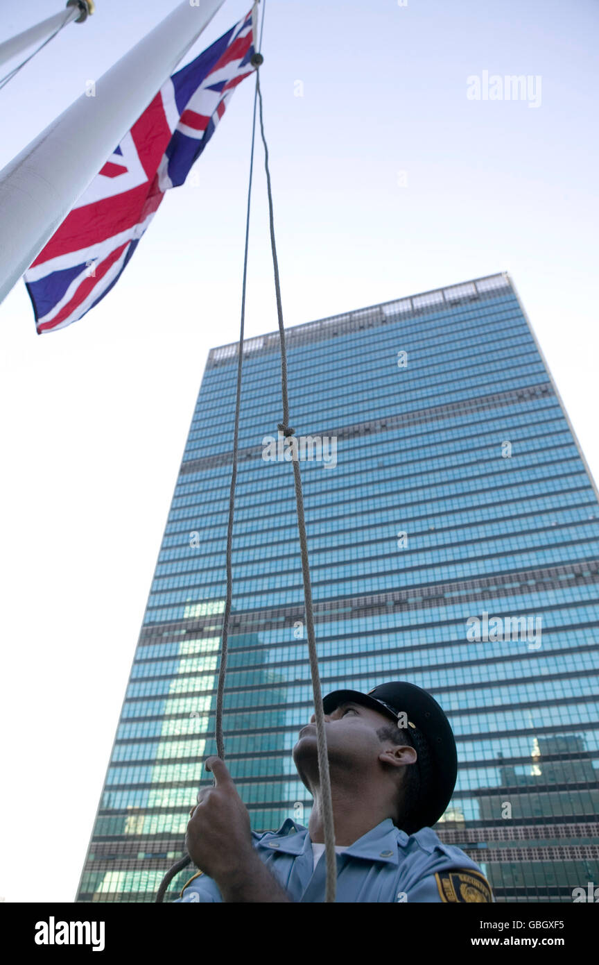 8 September 2005 - New York City - A security guard raises the United ...