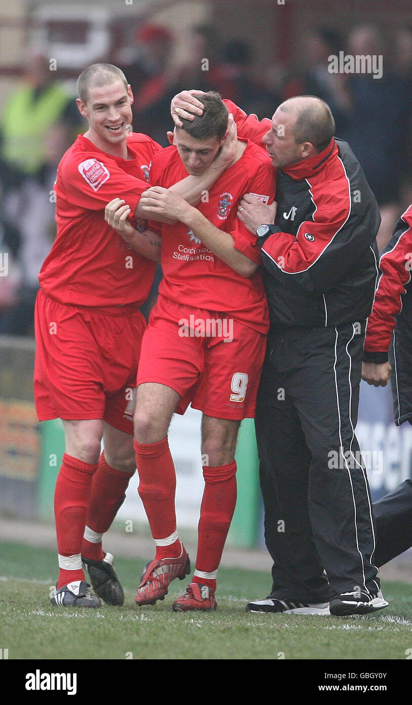 Accrington Stanley's Craig Lindfield (center) is congratulated on ...