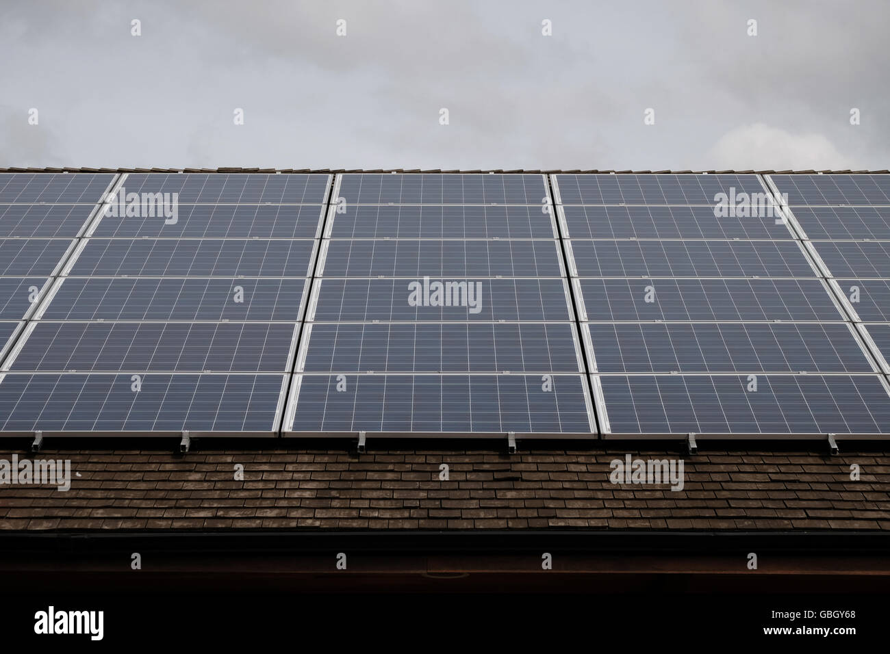 Solar panels situated on roof Stock Photo - Alamy