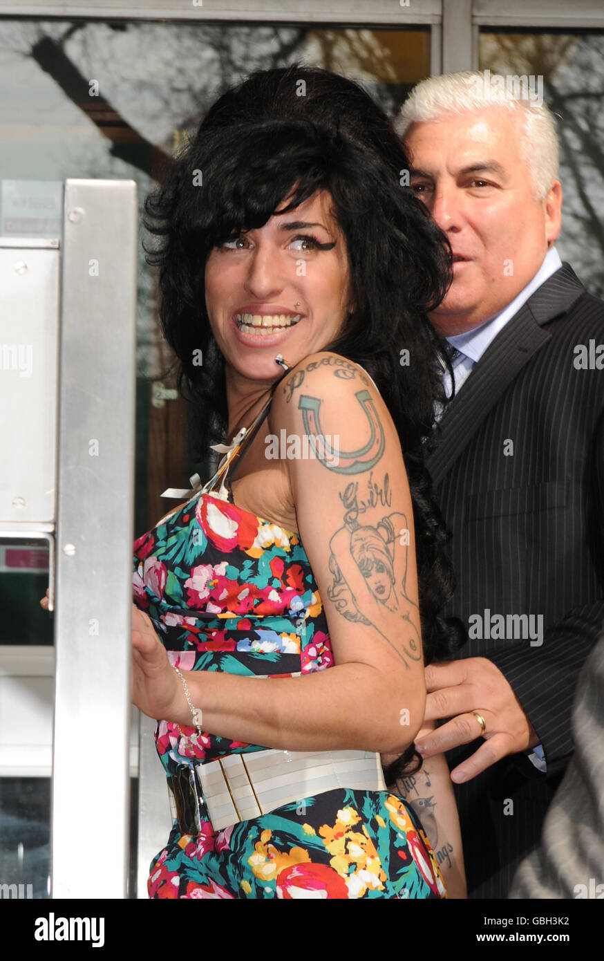 Amy Winehouse arrives with her father Mitch (right) at City of ...