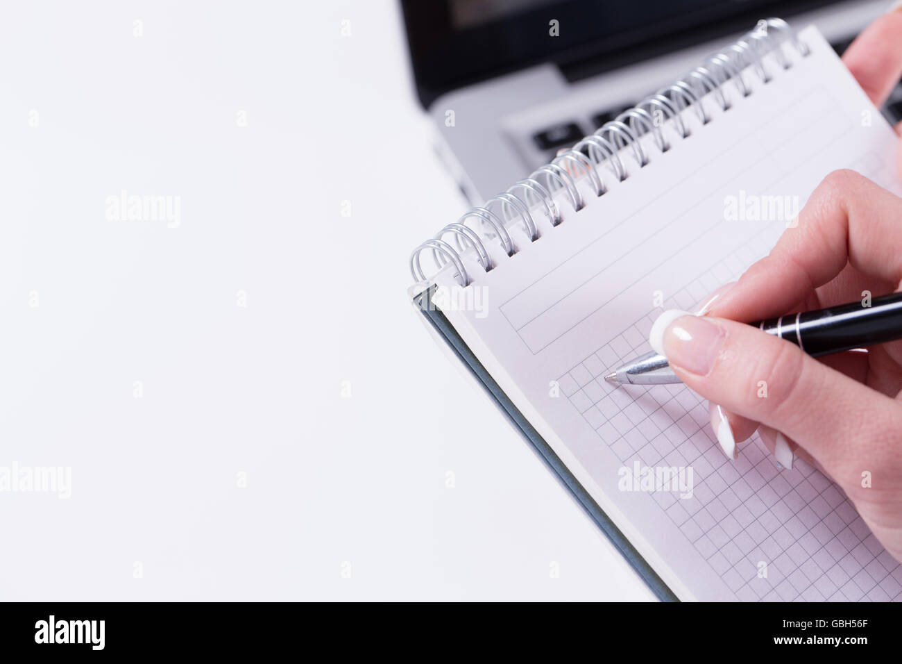 Woman with a notepad Stock Photo - Alamy