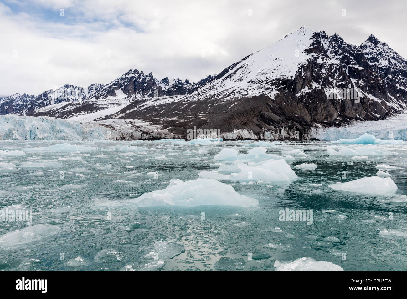 Iceberg and brash ice in Liefdefjorden, Svalbard Islands, Norway Stock ...
