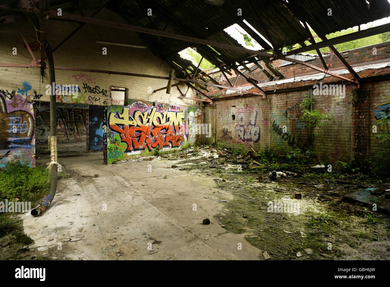 Graffiti and vandalism in abandoned derelict industrial building Stock ...
