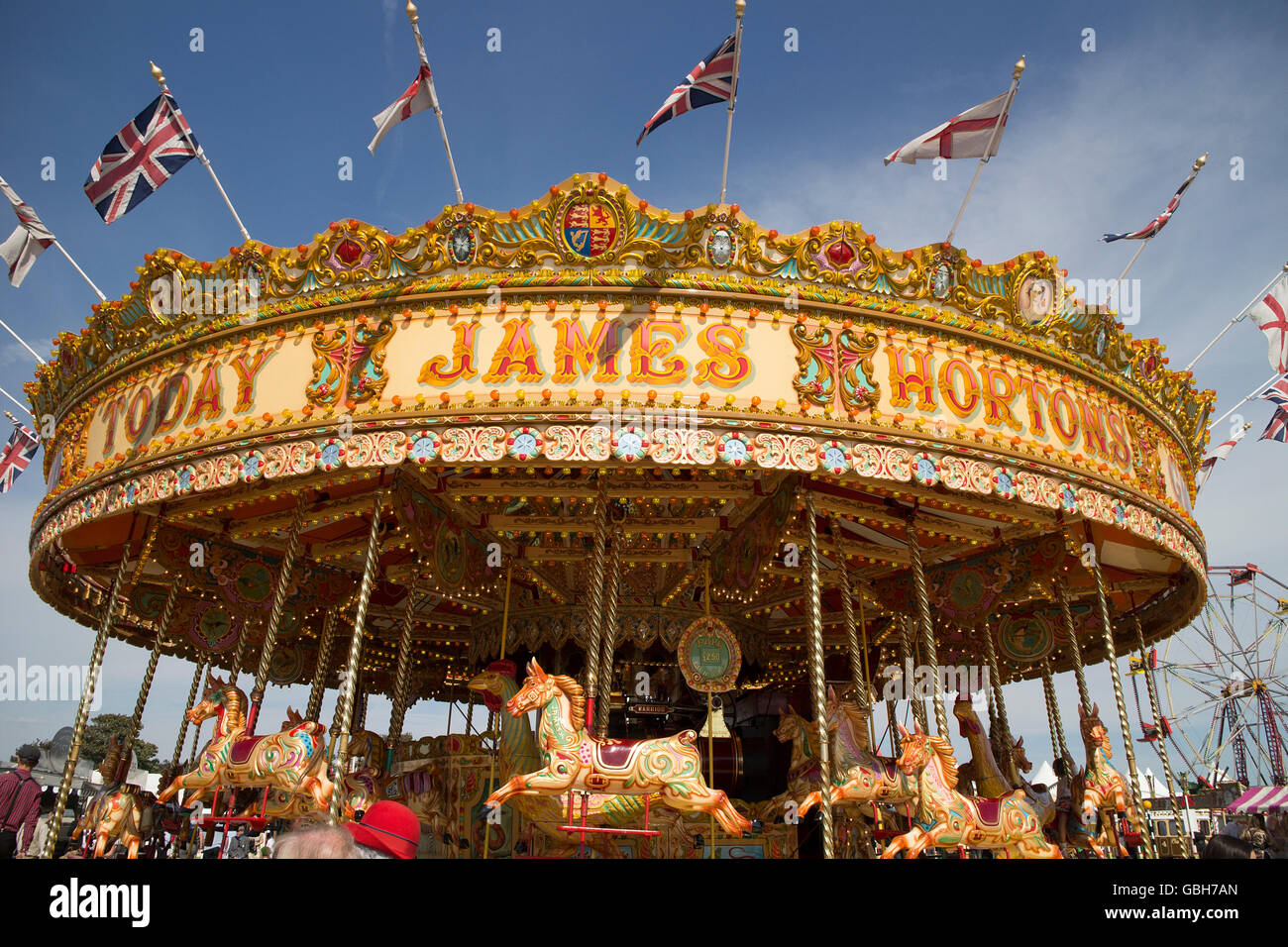 Fairground roundabout musical ride children riders traditional hi-res ...