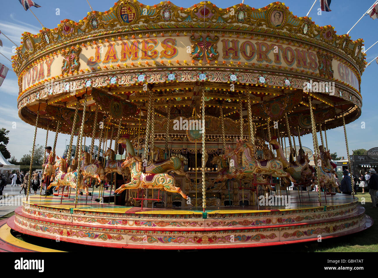Fairground roundabout musical ride children riders traditional hi-res ...