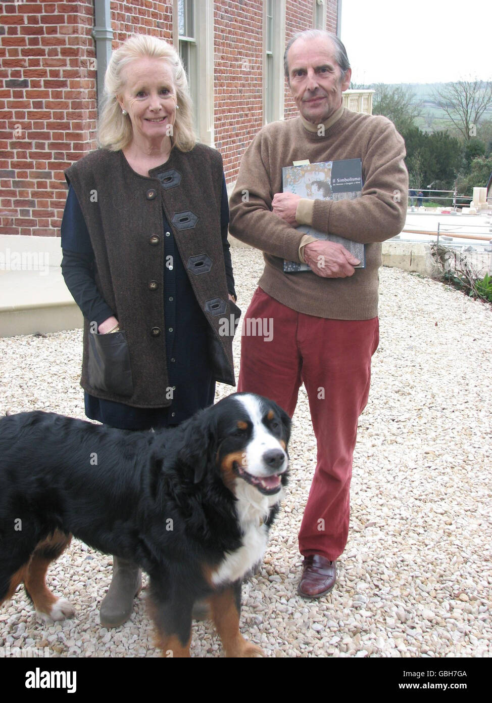 Susie and Esmond Bulmer, and their dog Echo outside their home in ...