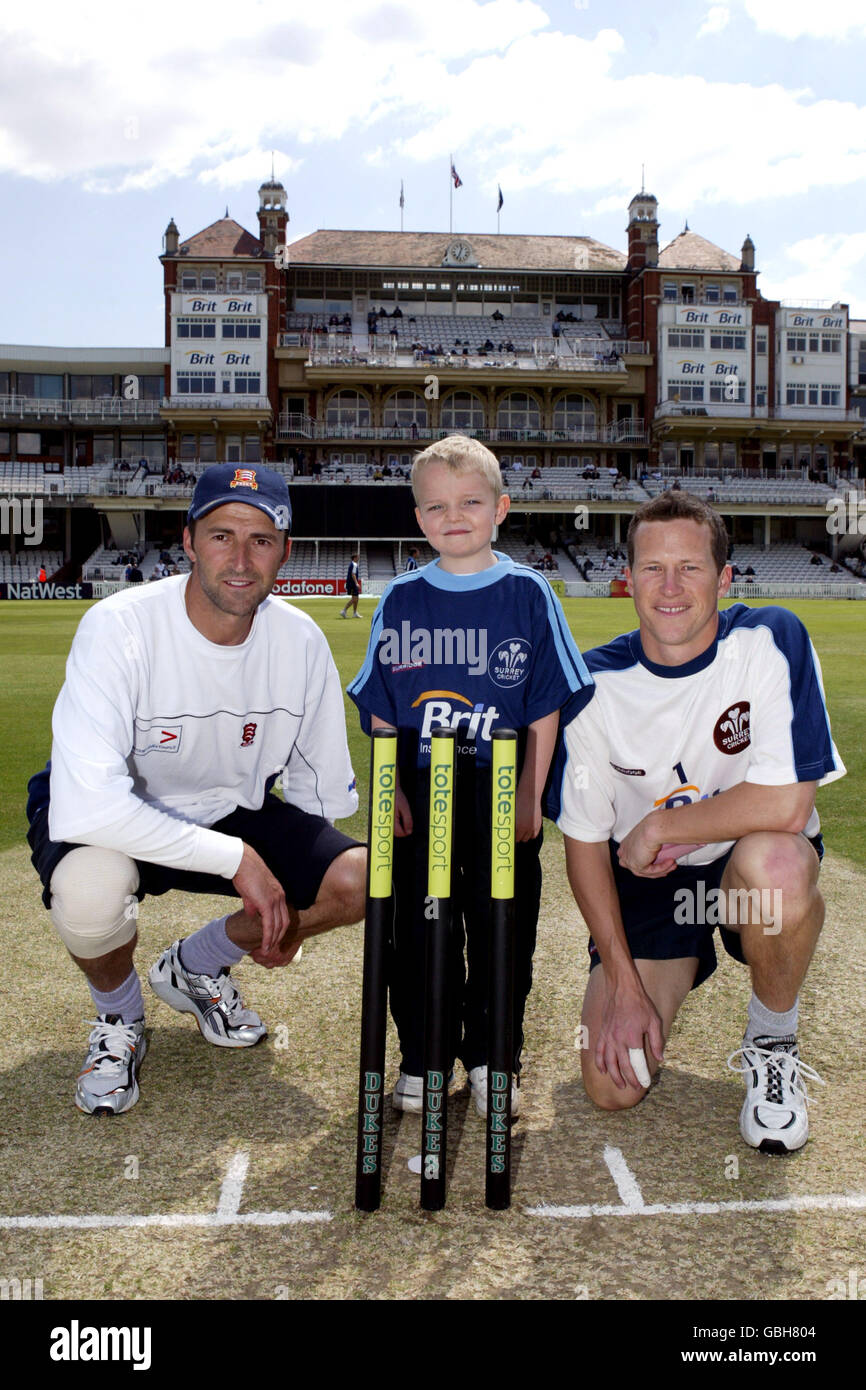 The Surrey mascot at the Brit Oval with club captain Jonathan Batty (r ...