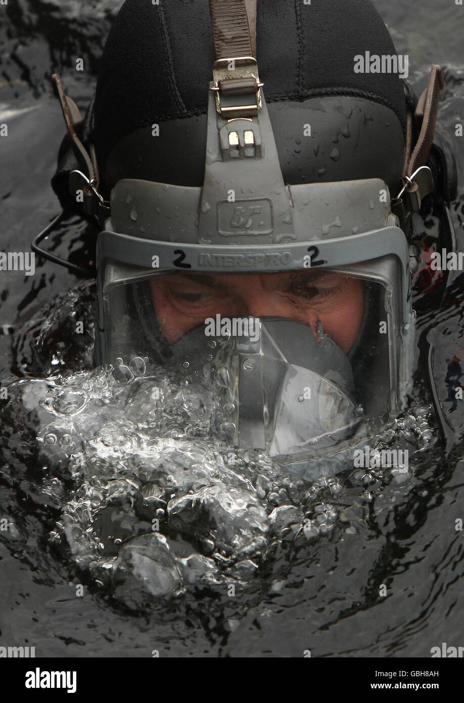 A Metropolitan Police diving team carry out a security search of the ...