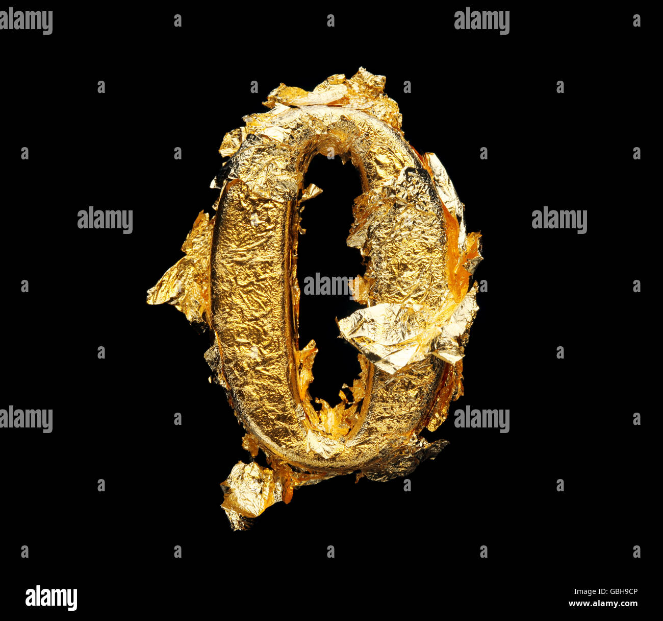 Alphabet and numbers in rough gold leaf isolated on black Stock Photo ...