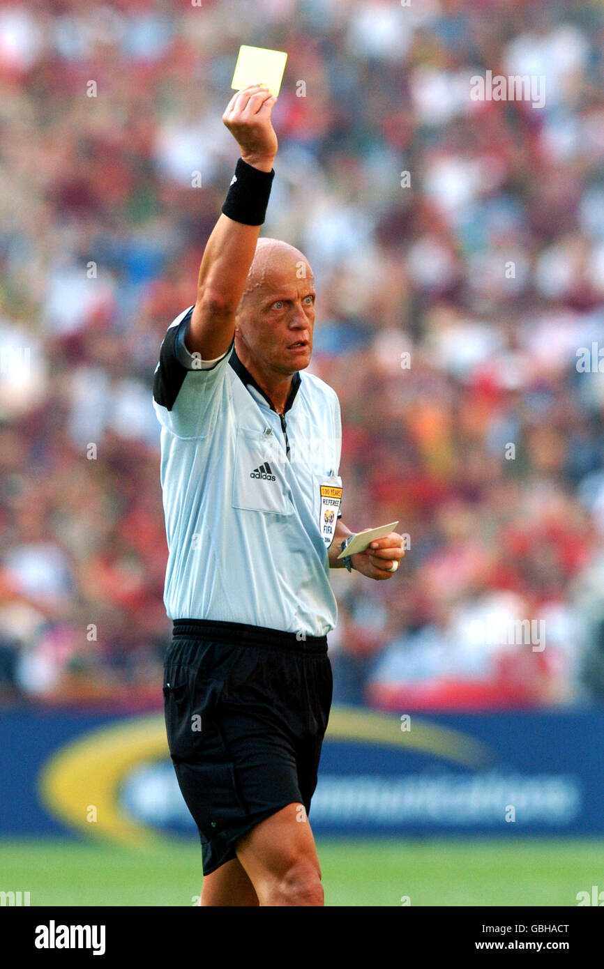 Referee pierluigi collina brandishes a yellow card hi-res stock ...