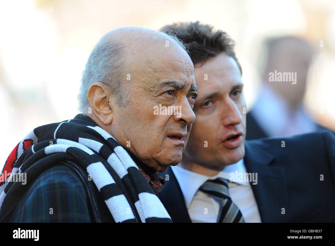Fulham chairman Mohammed Al Fayed (left) chats to Fulham chief ...