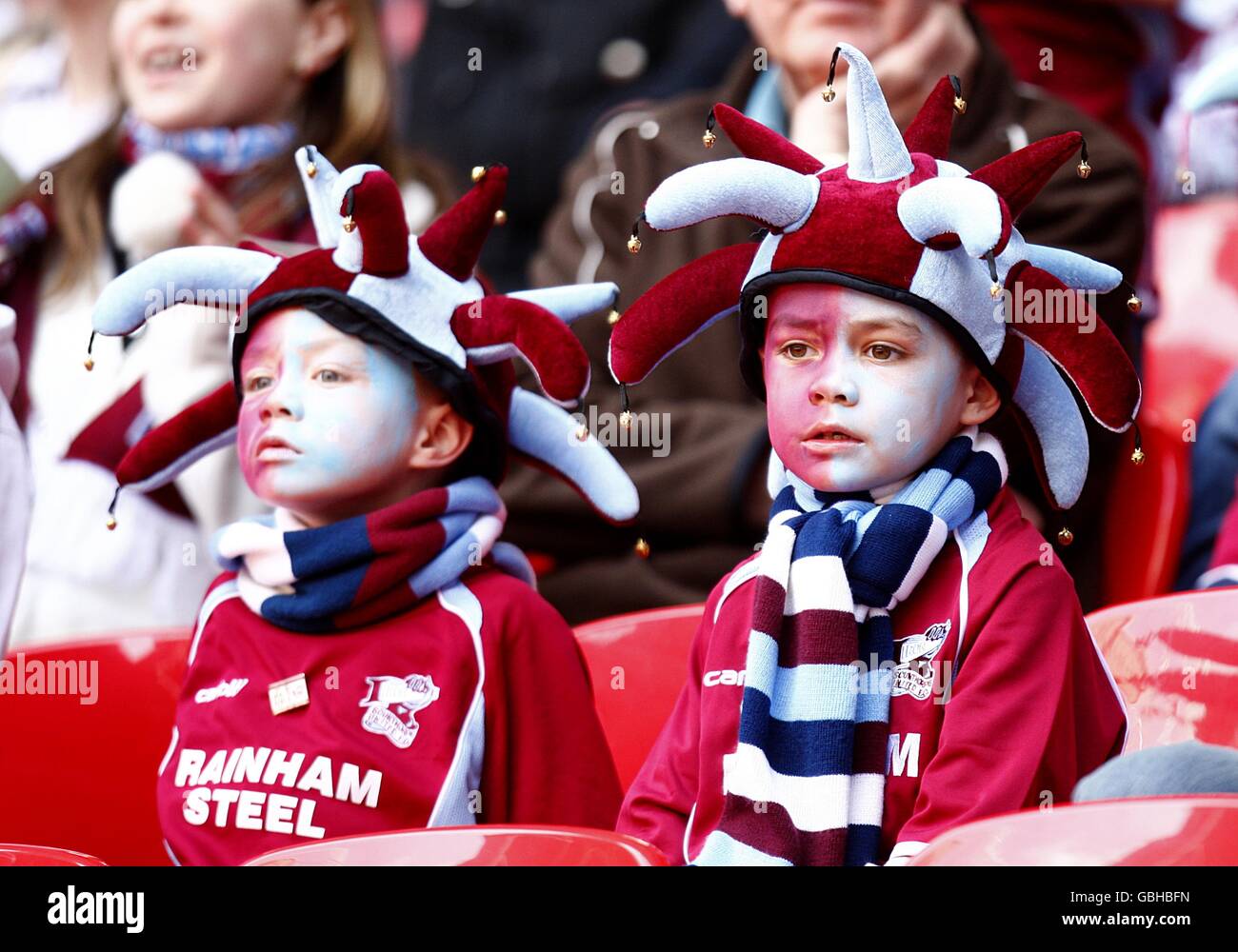Young Scunthorpe United fans soak up the atmosphere in the stands Stock ...