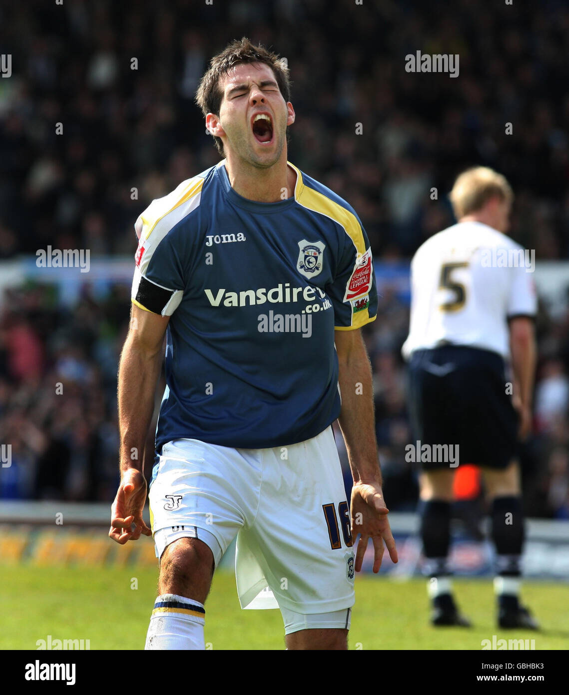 Cardiff City captain Joe Ledley shows his frustration after missing a ...