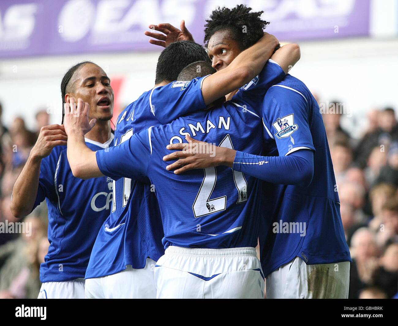 Everton's Joao Alves Jo (right) celebrates scoring his sides first goal ...