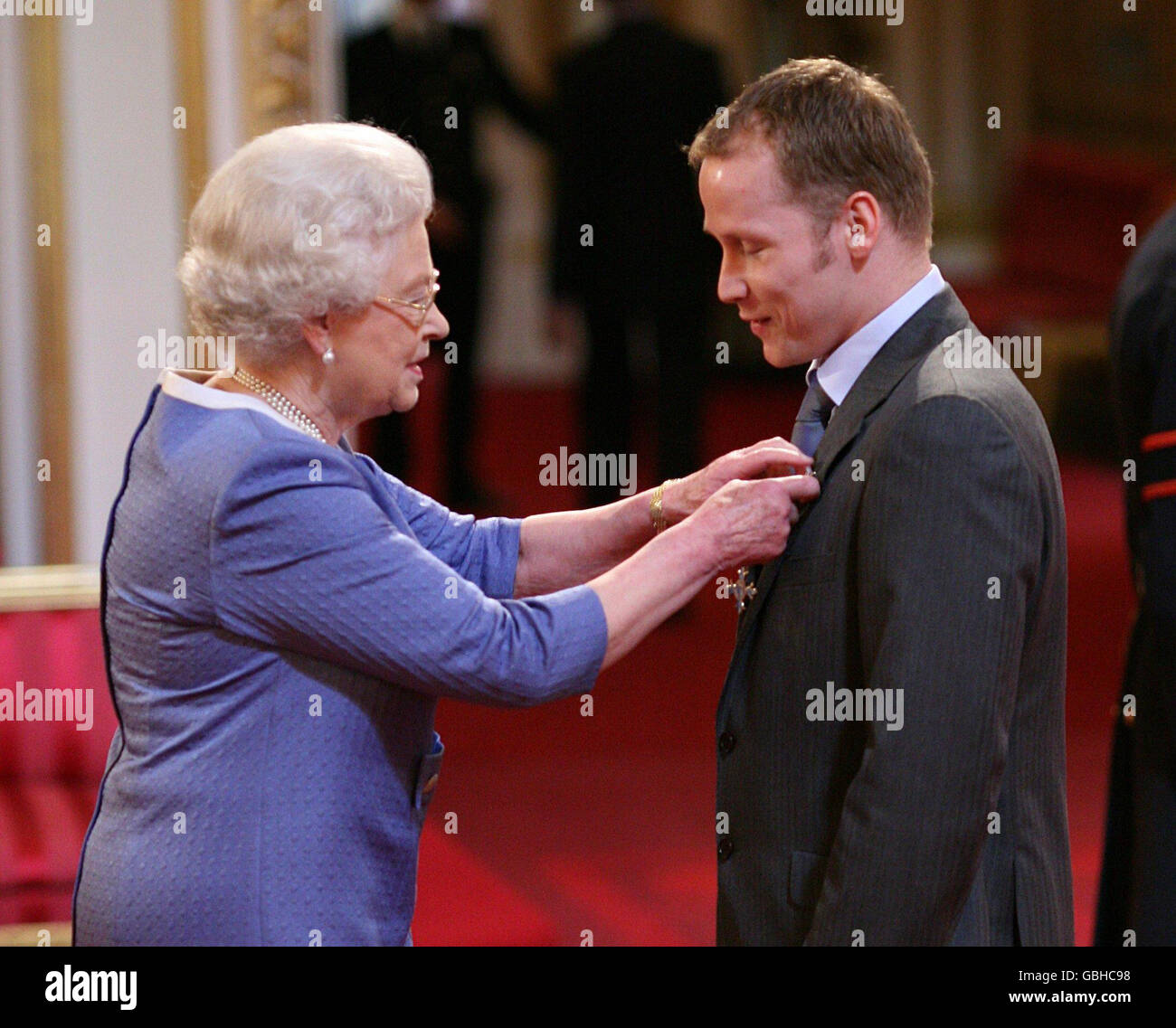 Receives obe queen buckingham palace hi-res stock photography and ...