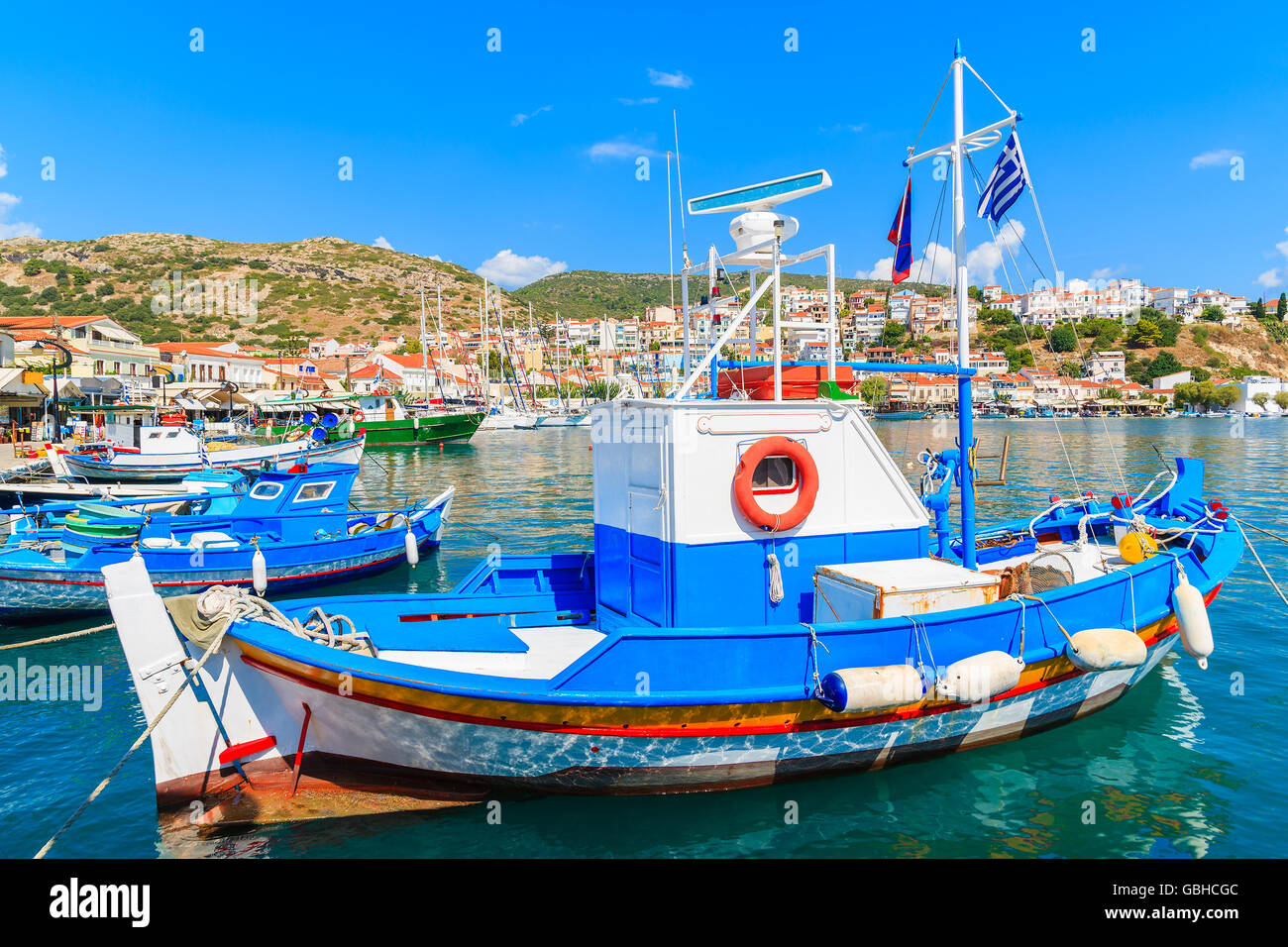Traditional colourful Greek fishing boat in Pythagorion port, Samos ...