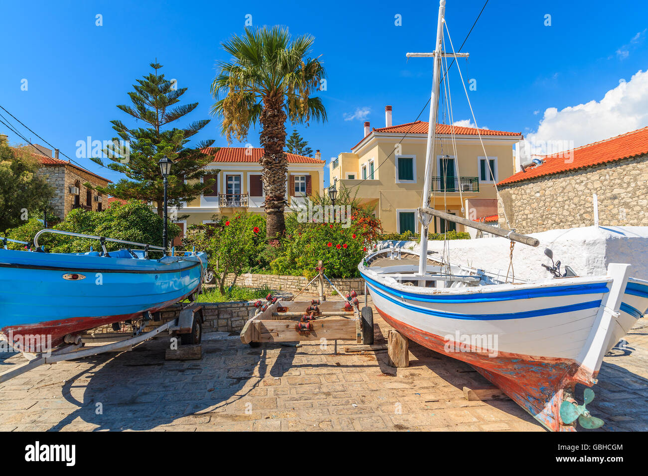 Fishing boats in dock of Pythagorion port with traditional colourful ...