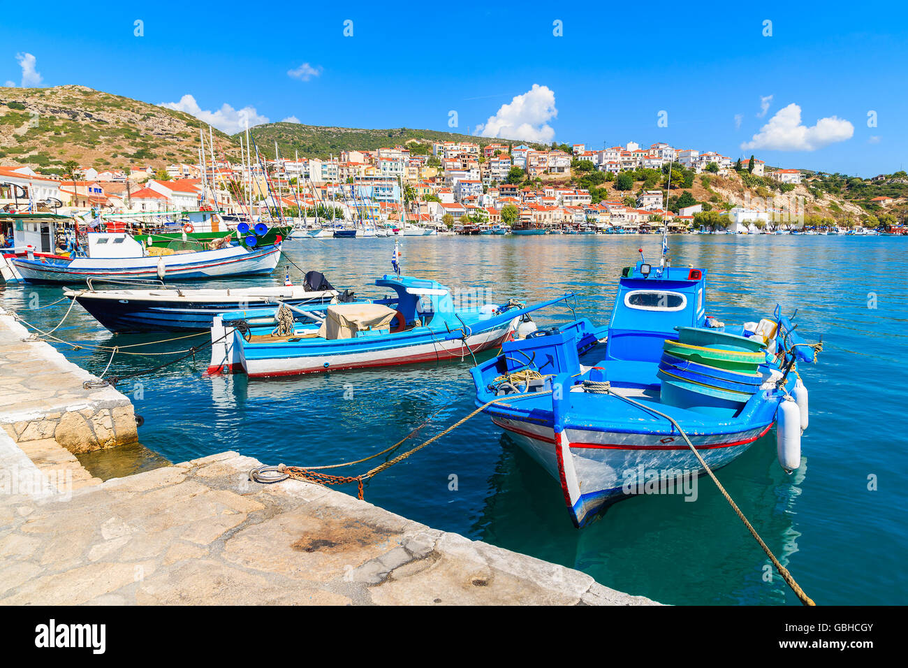 Traditional Greek fishing boats in Pythagorion port, Samos island ...